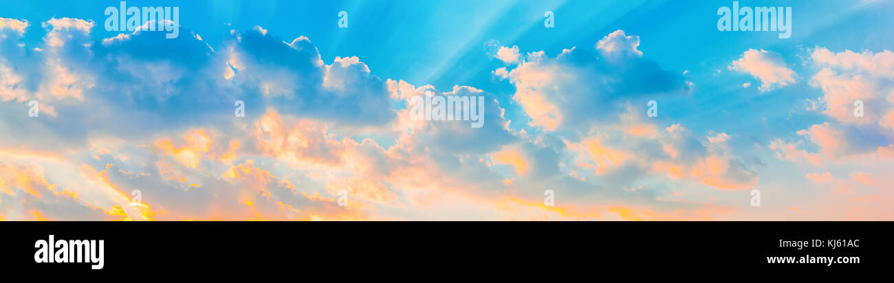 Cloudy golden sky panorama. Panoramic cloudscape view Stock Photo - Alamy