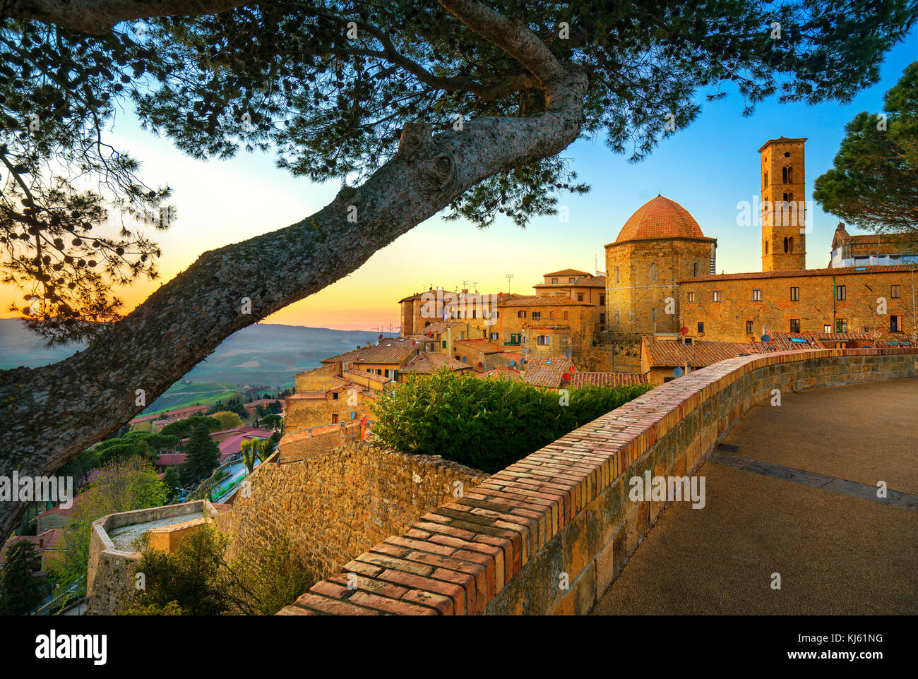 Tuscany, Volterra town skyline, church and trees on sunset. Maremma ...