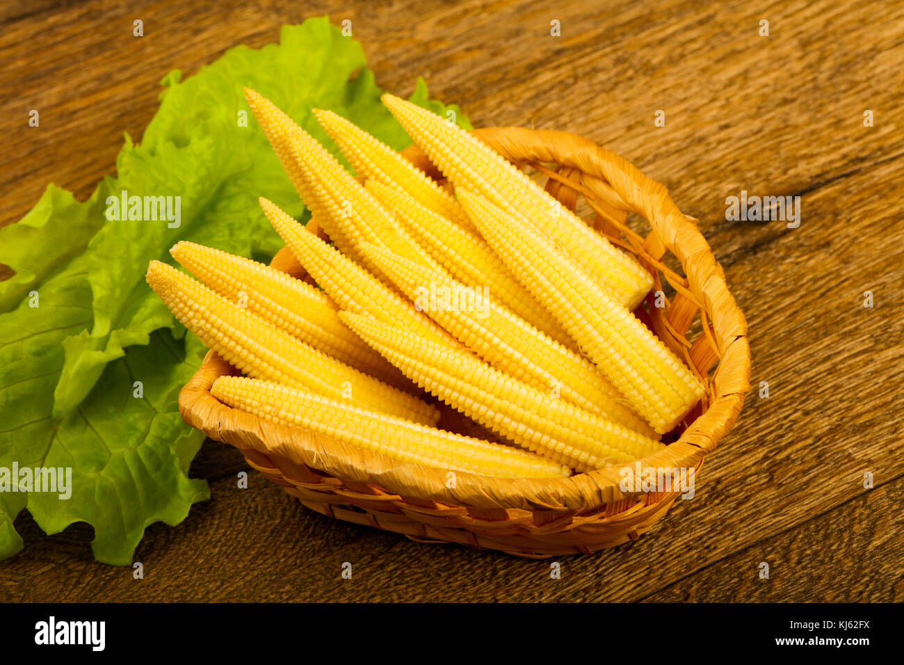 Young raw baby corn Stock Photo - Alamy