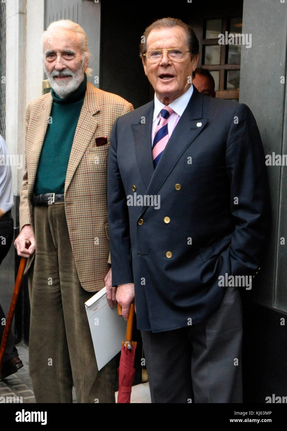 LONDON, ENGLAND - APRIL 26: Sir Christopher Lee, Sir Rodger Moore ...