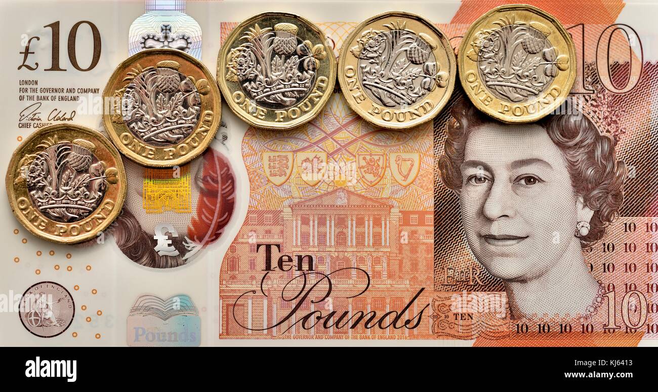 Ten pound note and one pound coins Stock Photo - Alamy