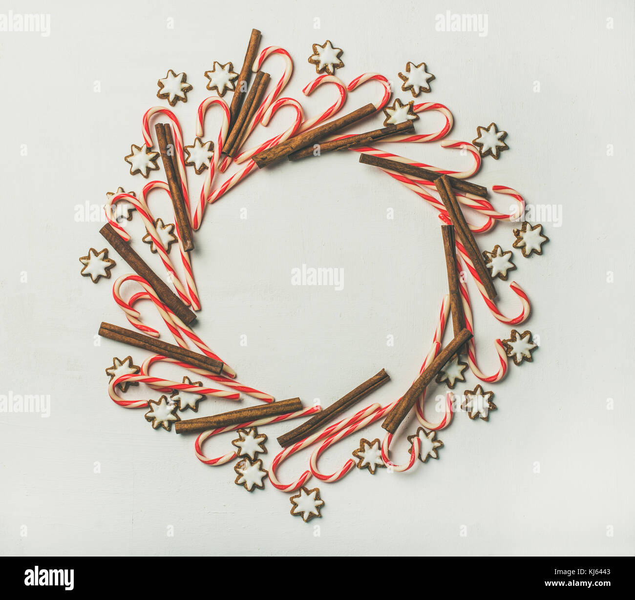 Christmas wreath pattern made from candy cane sticks and cinnamon Stock ...