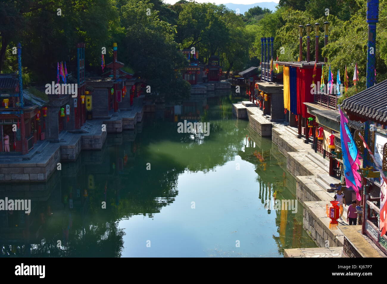 small houses by the riverside. vibrant, warm colors Stock Photo - Alamy