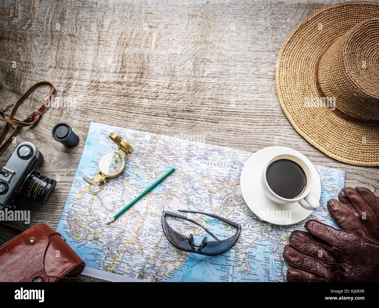 Planning new travel destinations on the world map. Top view Stock Photo ...