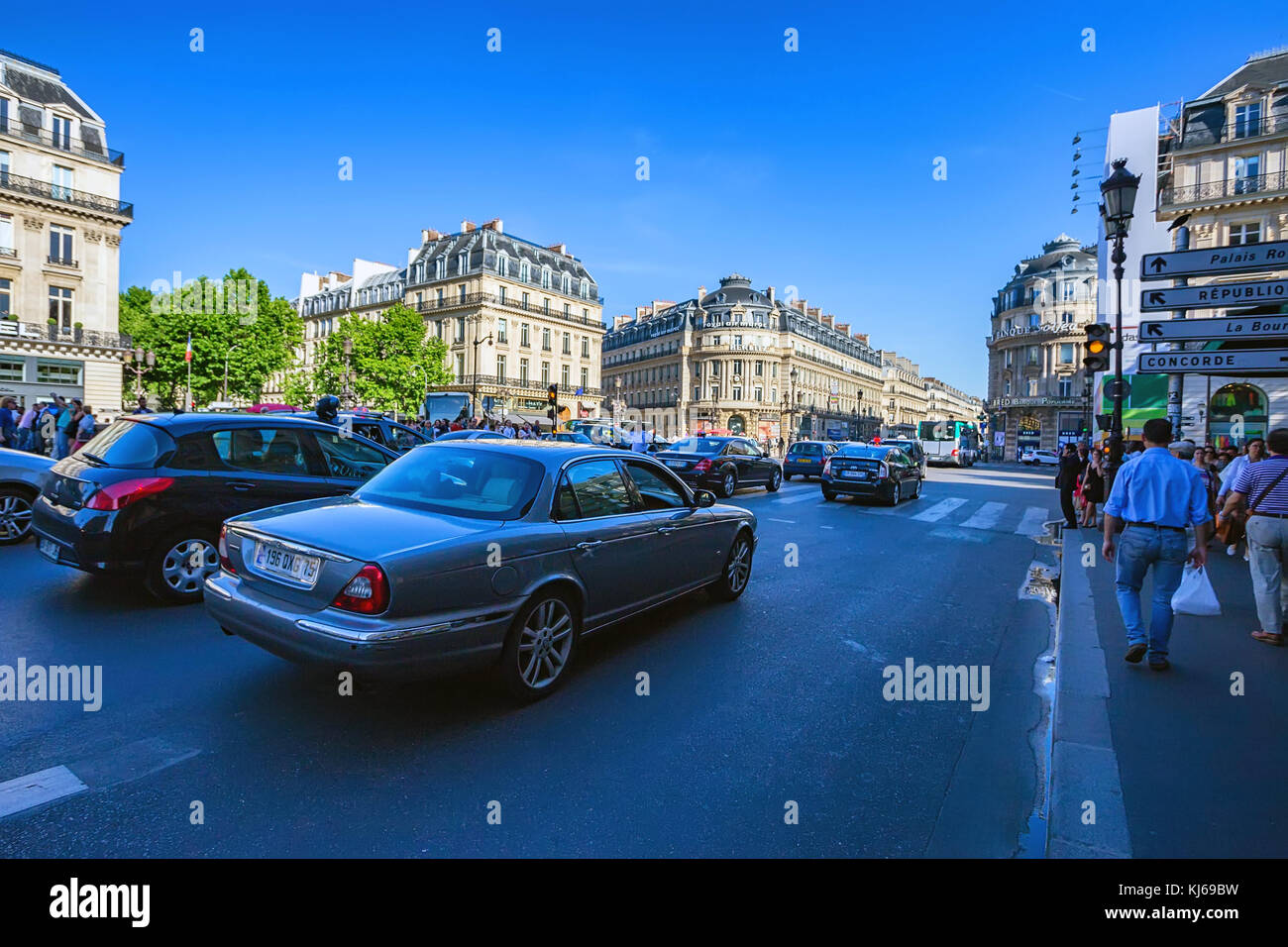 PARIS, FRANCE - JUNE 2014: City street on sunny afternoon Stock Photo ...