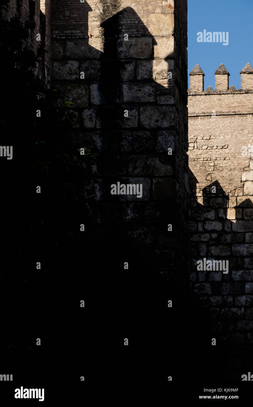 Castle wall with shadows Stock Photo - Alamy