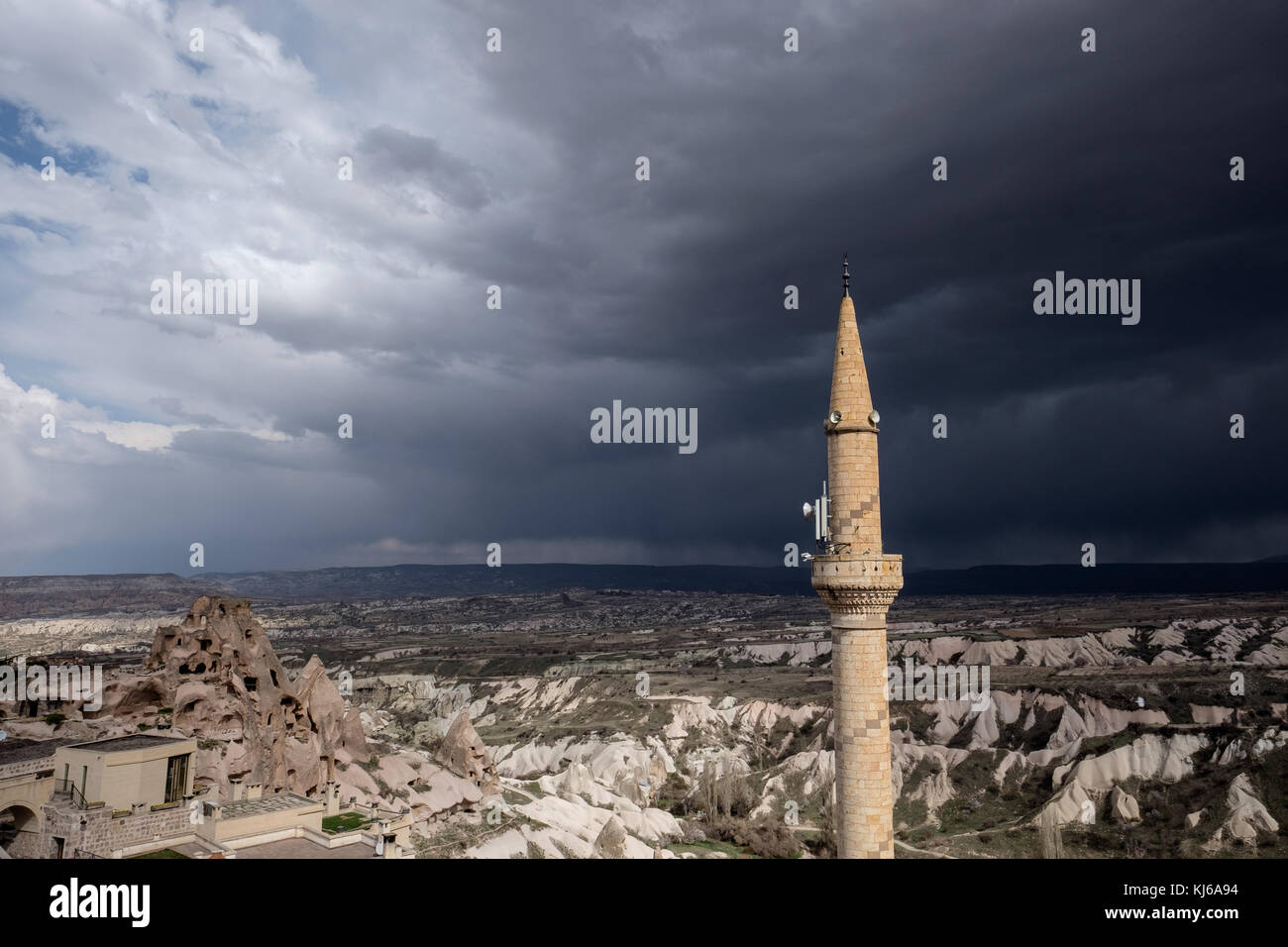 A minaret stands in the amazing landscape of cappadocia Stock Photo - Alamy