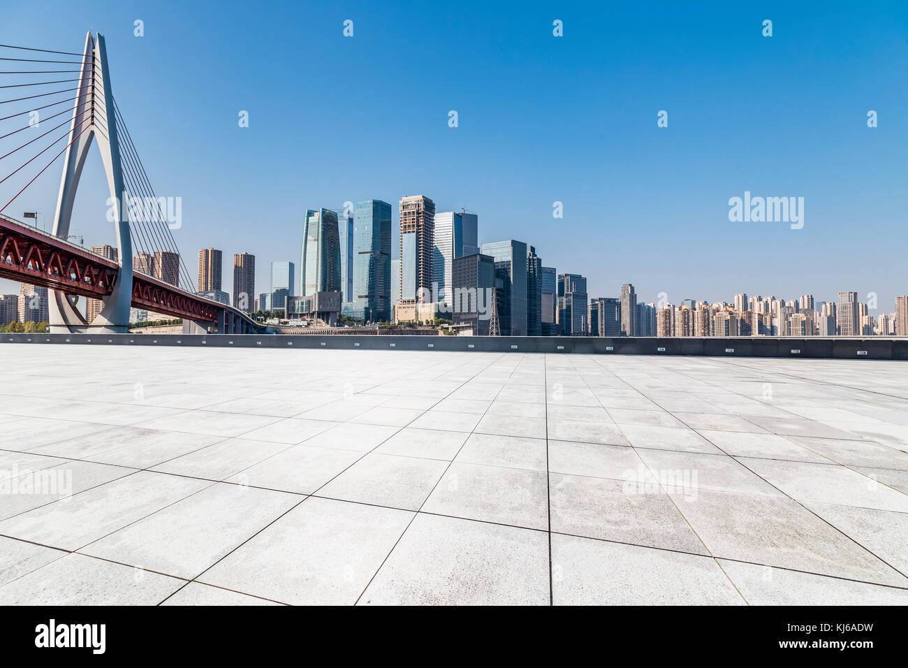 Panoramic skyline and buildings with empty concrete square floor ...