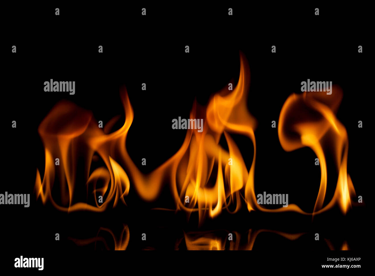 Grainy fire flames isolated on black background Stock Photo - Alamy