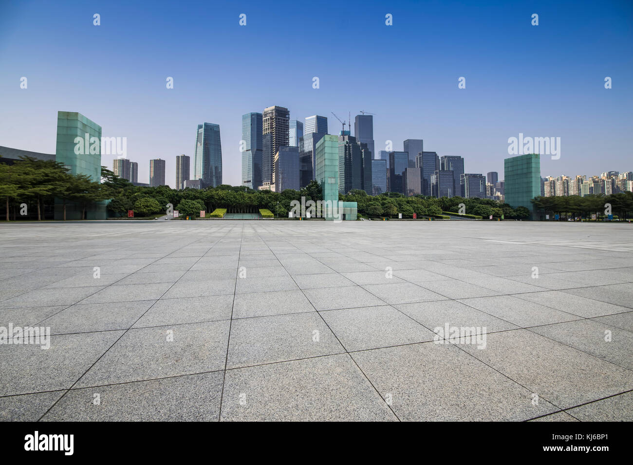 Panoramic skyline and buildings with empty concrete square floor ...