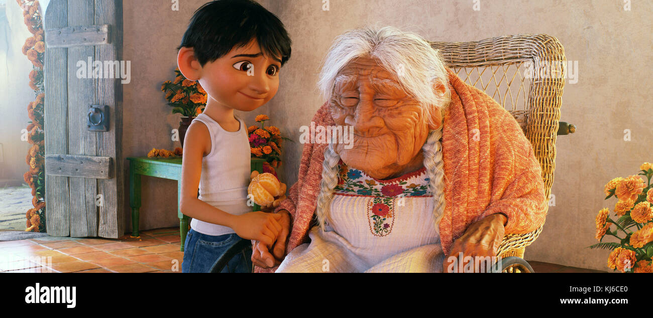 COCO, from left: Miguel (voice: Anthony Gonzalez), Mama Coco (voice ...