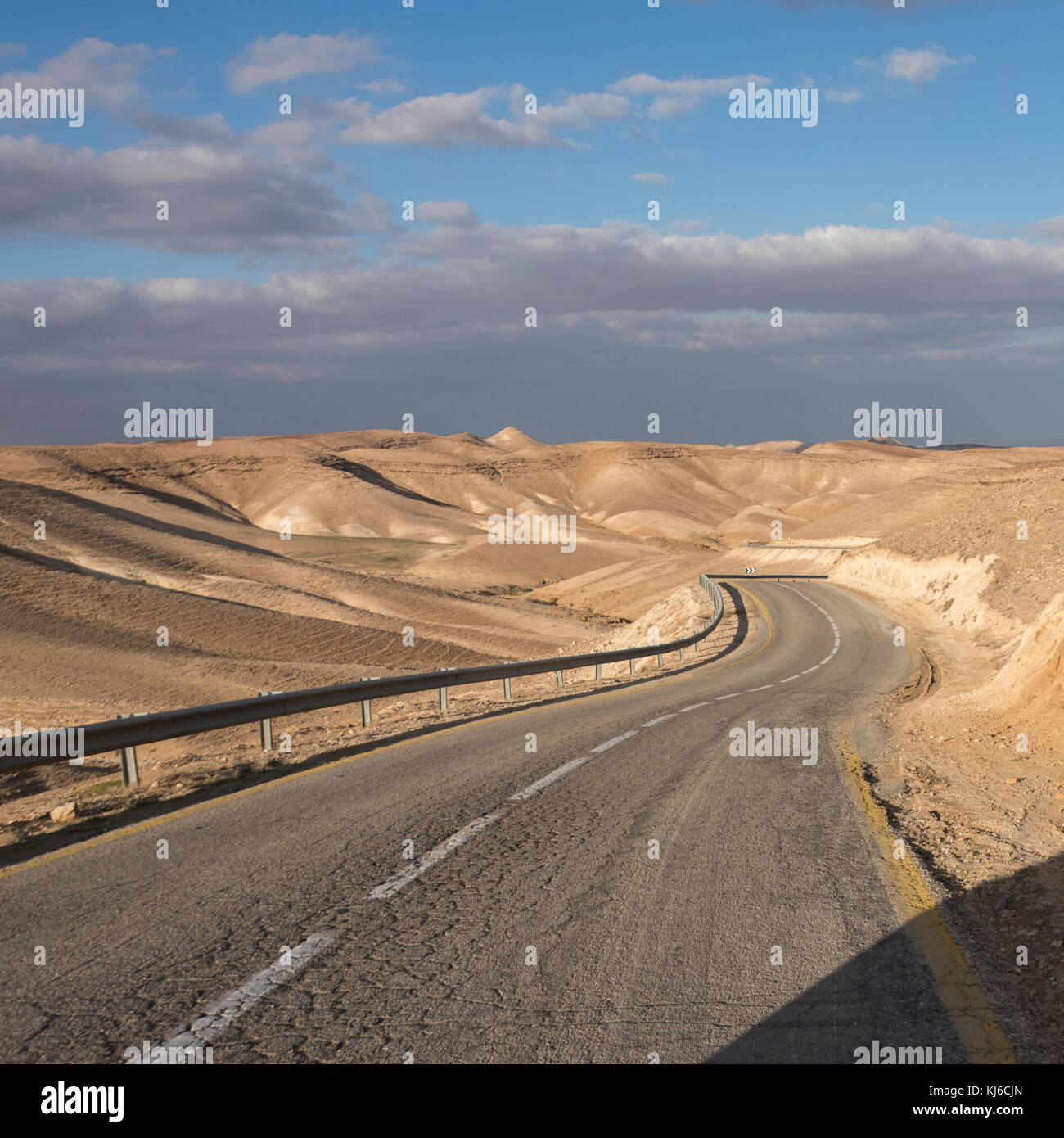 Road passing through a desert, Judean Desert, Dead Sea Region, Israel ...