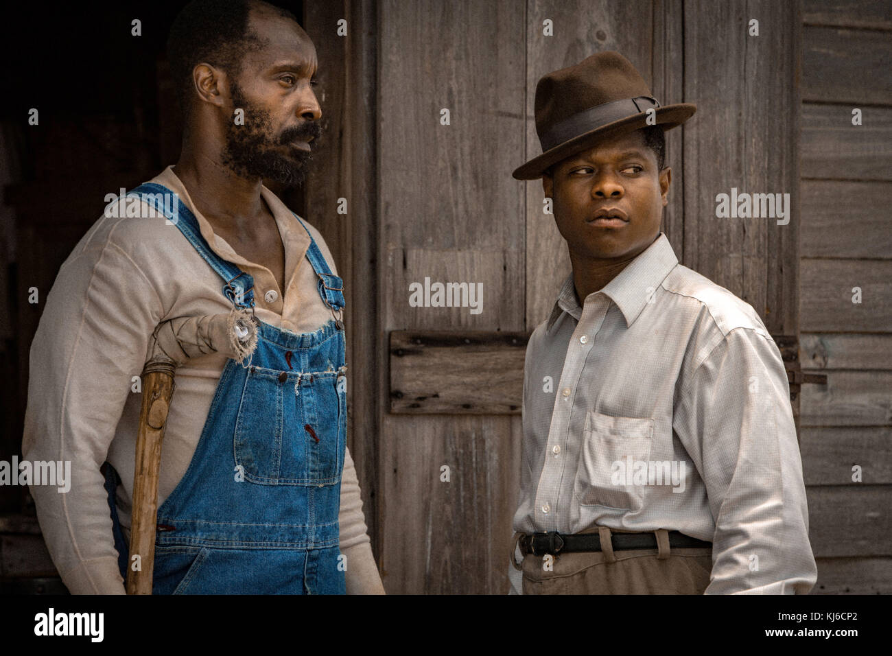 MUDBOUND, from left: Rob Morgan, Jason Mitchell, 2017. ph: Steve Dietl ...