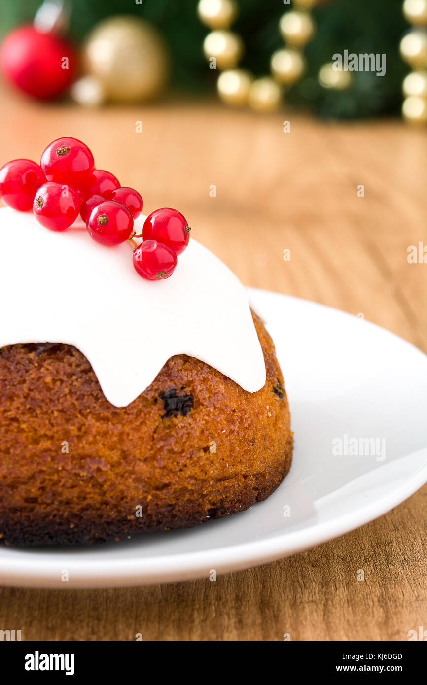 Christmas pudding on wooden table Stock Photo - Alamy