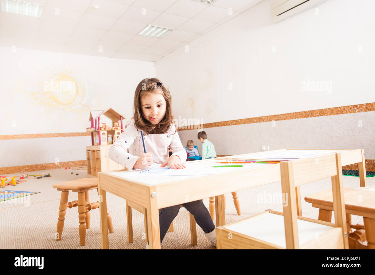Drawing lesson in kindergarten Stock Photo - Alamy