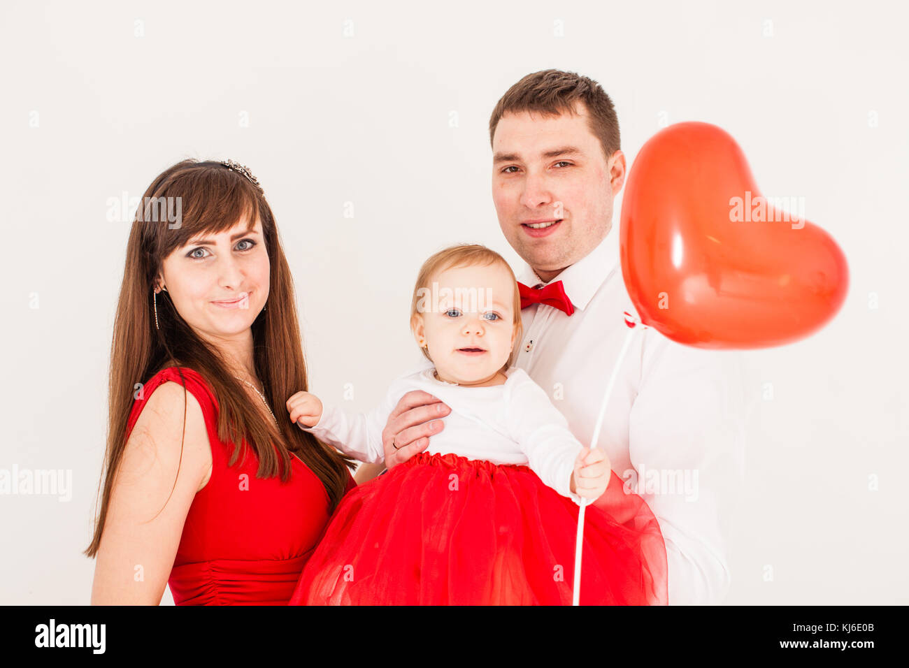 Happy family heart balloon Stock Photo - Alamy