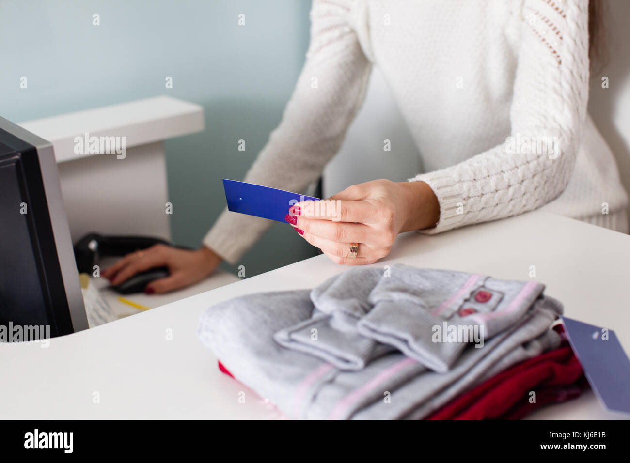 Seller conscientiously works Stock Photo - Alamy