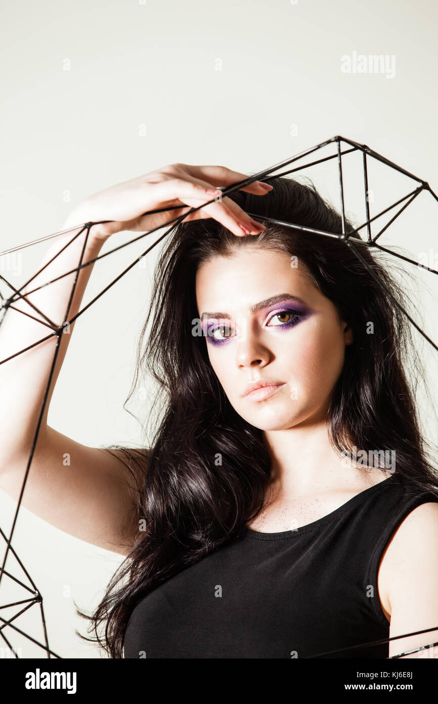 Female holding model of geometric solid Stock Photo - Alamy