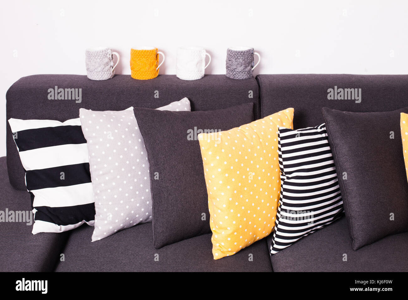 Sofa with pillows Stock Photo - Alamy