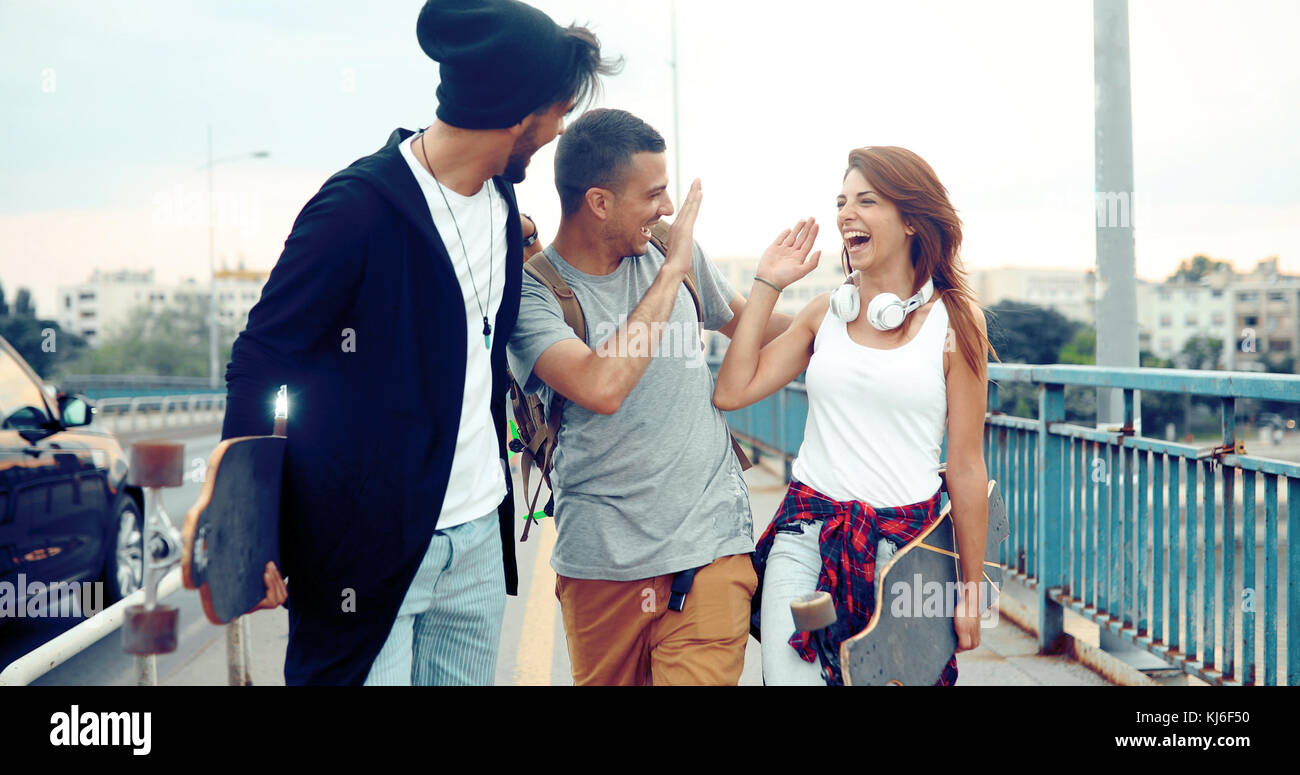 Group of happy friends hang out together Stock Photo - Alamy