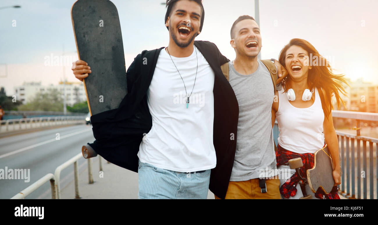 Group of happy friends hang out together Stock Photo - Alamy