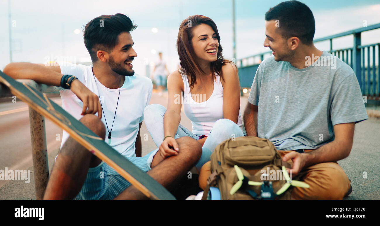 Group of happy friends hang out together Stock Photo - Alamy