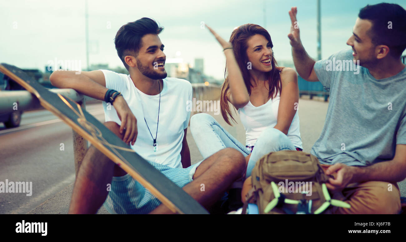 Group of happy friends hang out together Stock Photo - Alamy