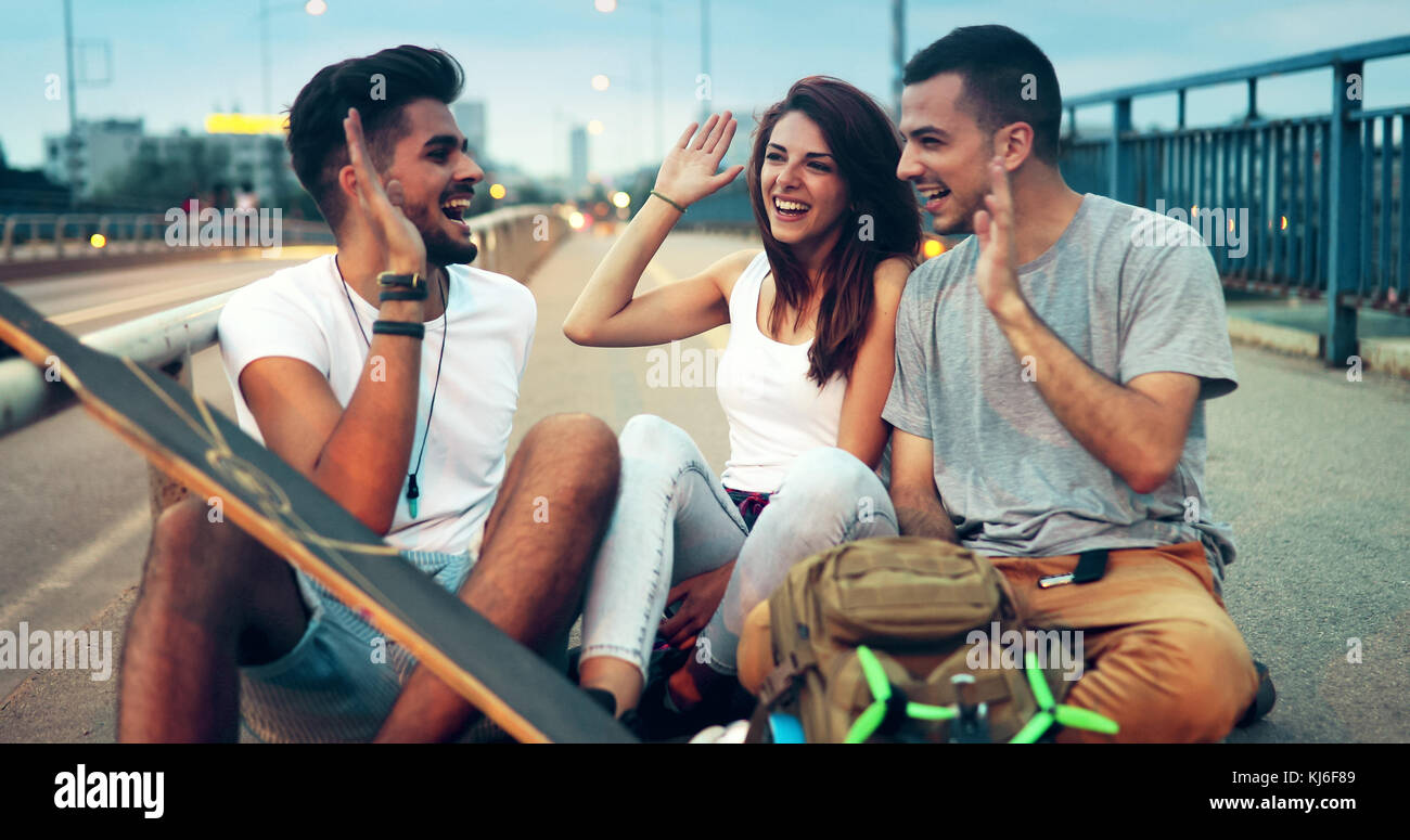 Group of happy friends hang out together Stock Photo - Alamy