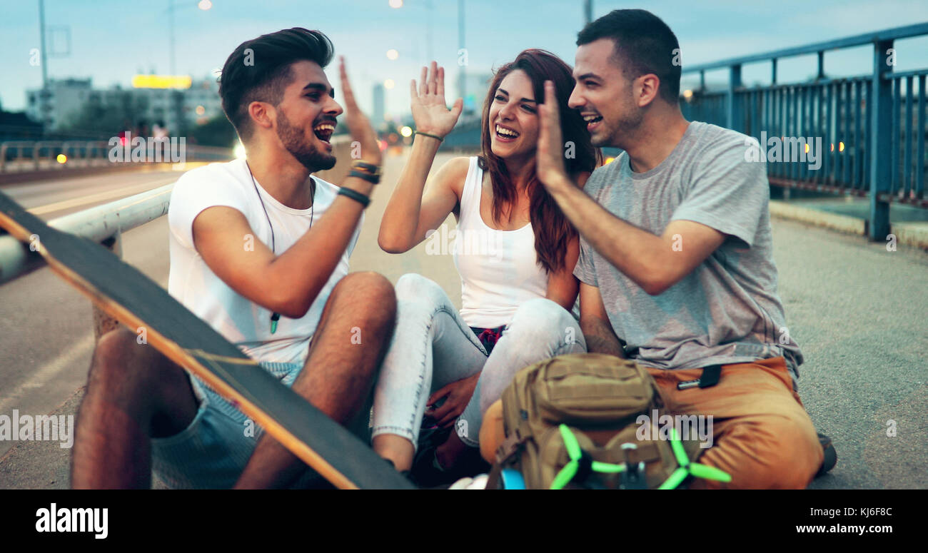 Group of happy friends hang out together Stock Photo - Alamy