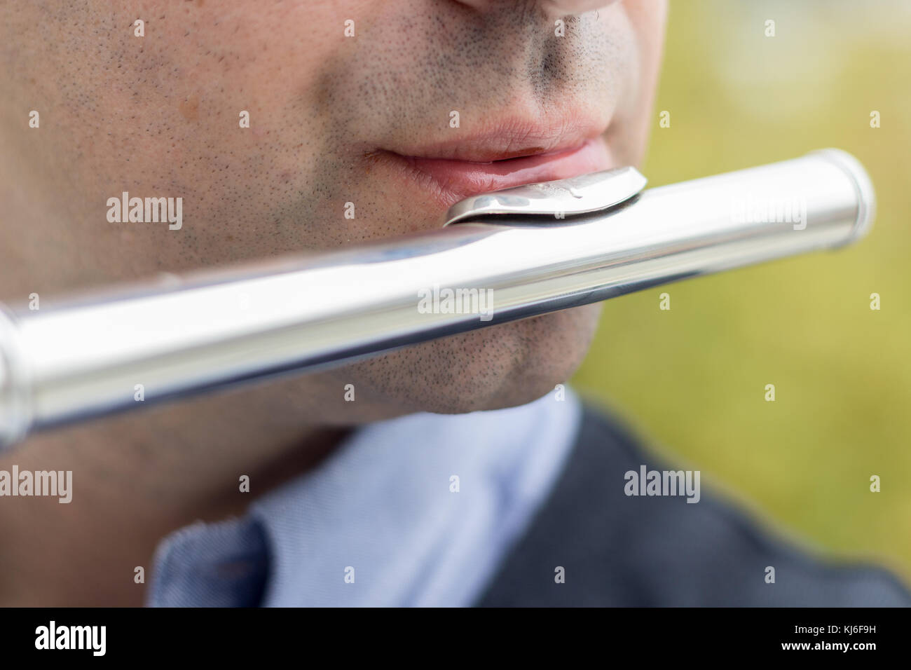 Man playing the transverse flute hi-res stock photography and images ...