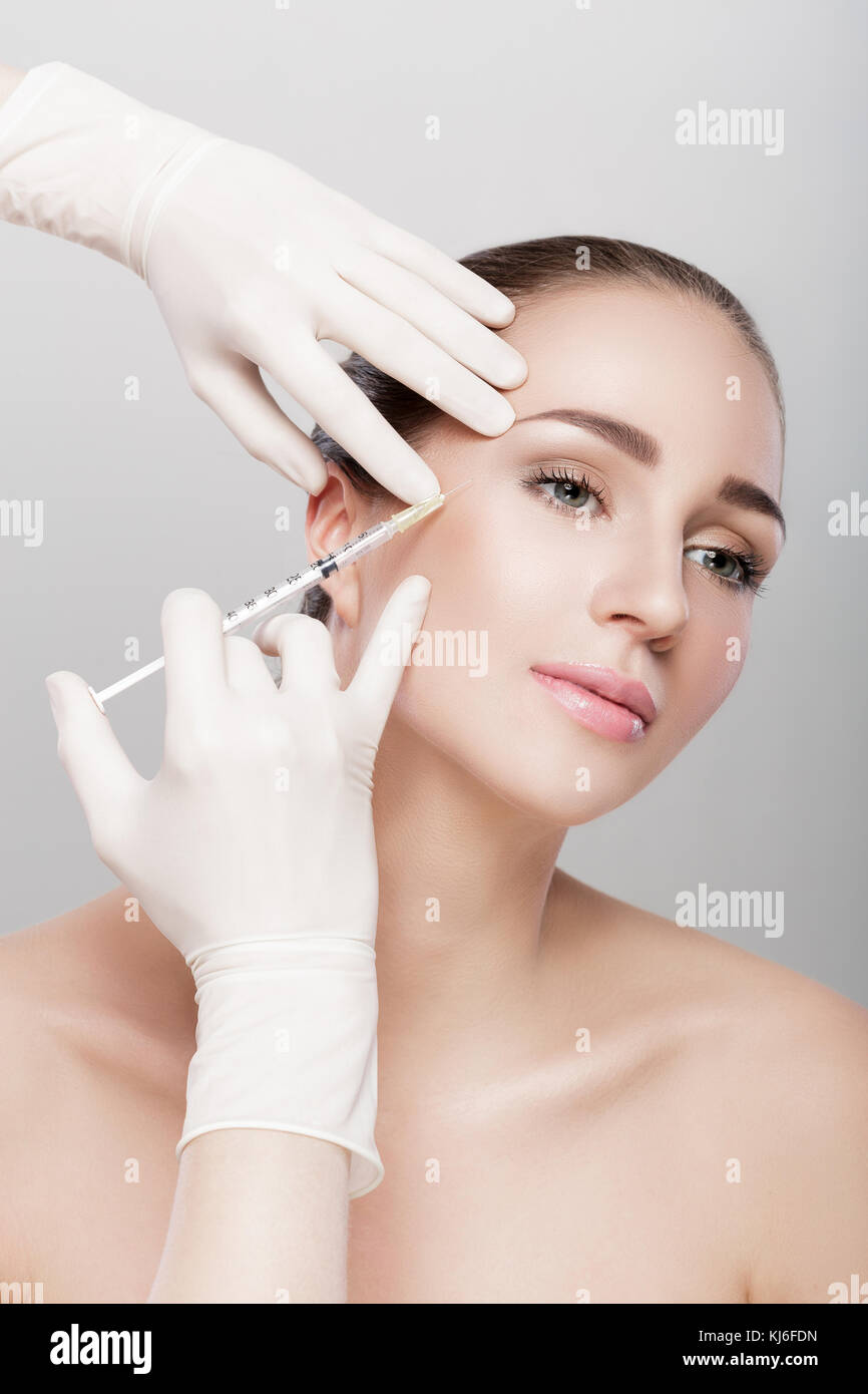 beautiful woman getting injection Stock Photo - Alamy