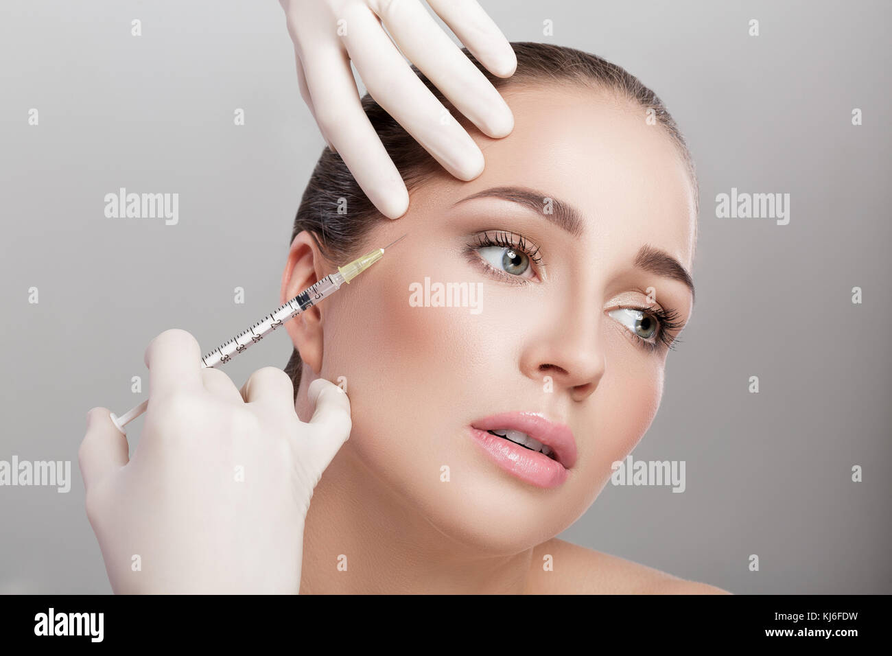 beautiful woman getting injection Stock Photo - Alamy