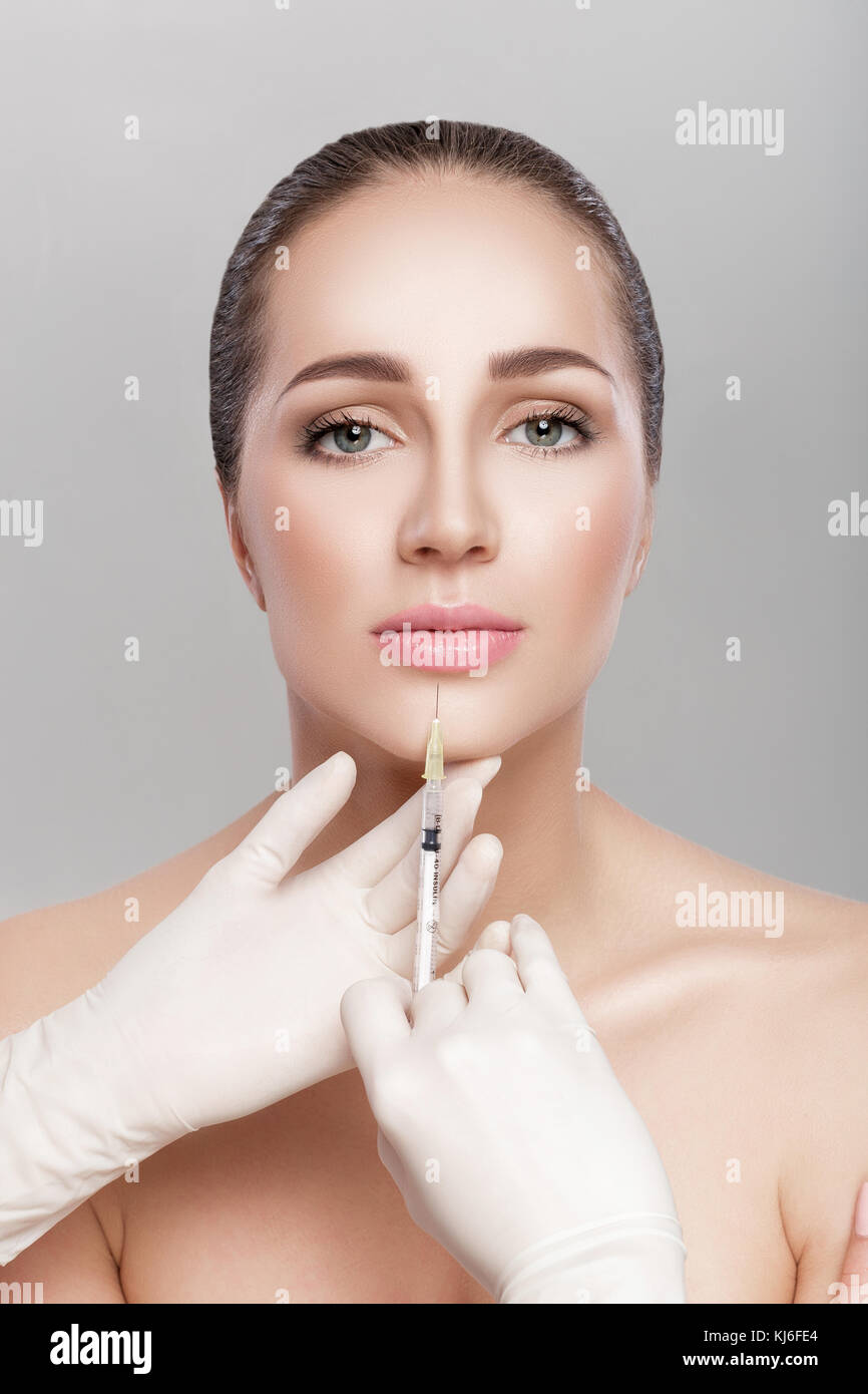 beautiful woman getting injection Stock Photo - Alamy