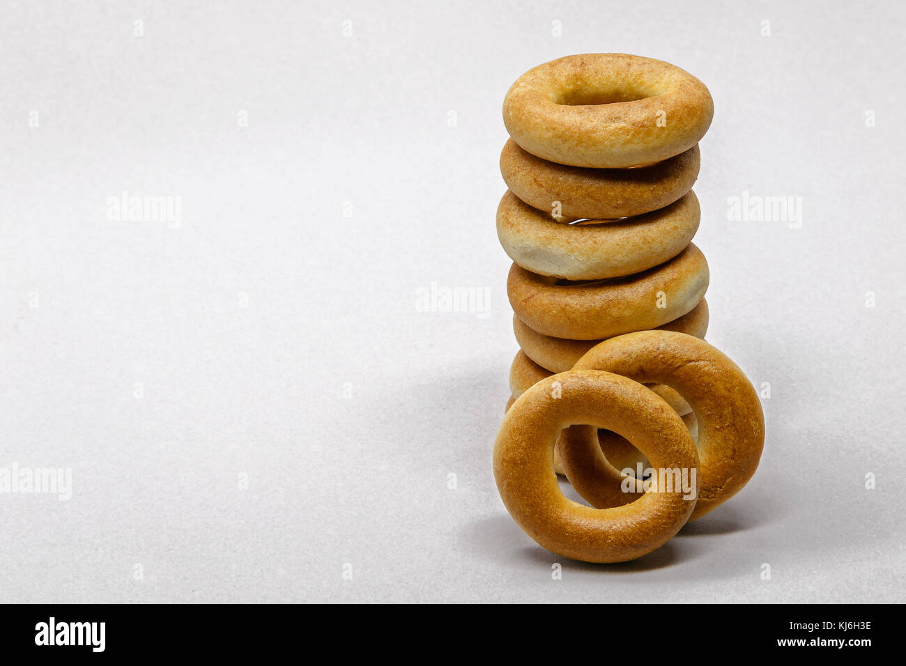 Stack of Russian bread rings isolated on light background Stock Photo ...