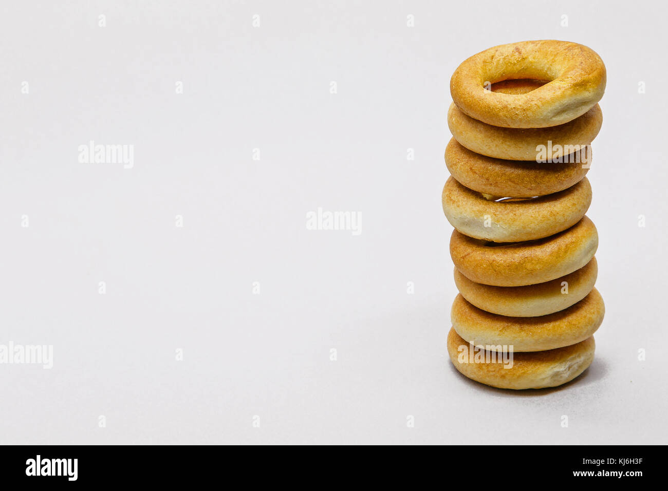 Stack of Russian bread rings isolated on light background Stock Photo ...