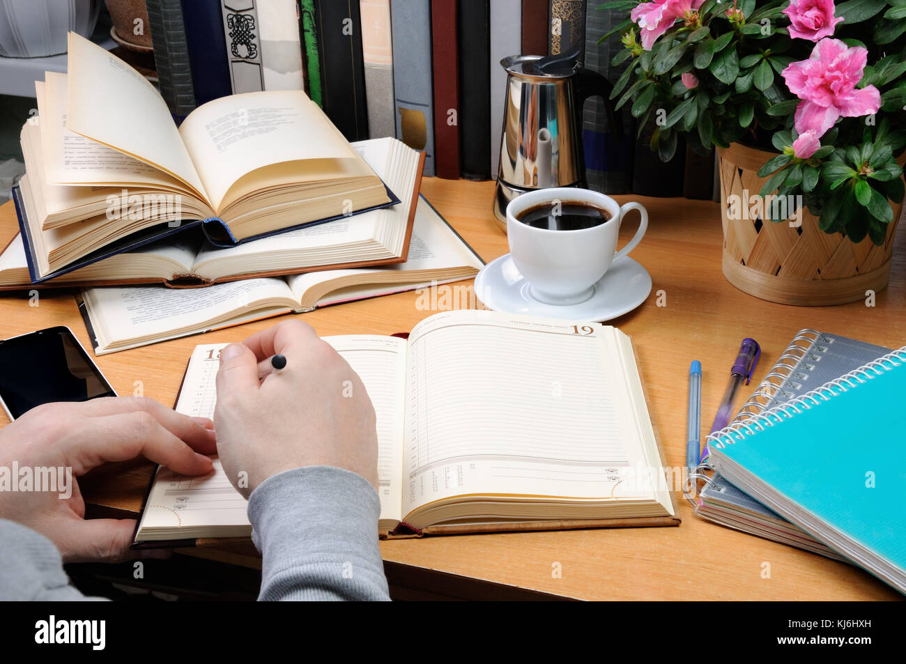 Holds notebooks hi-res stock photography and images - Alamy