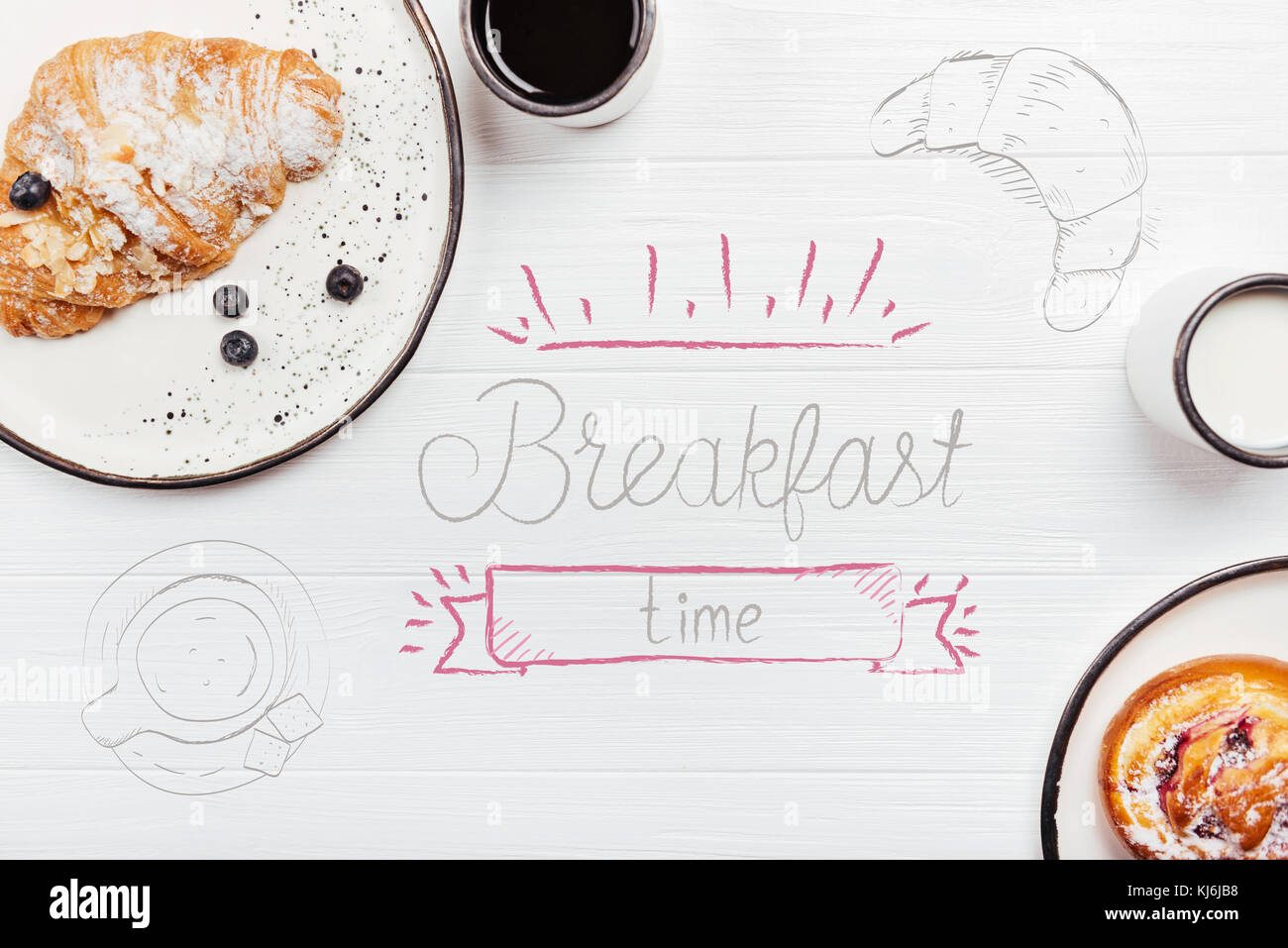 Plate with croissant standing on the table Stock Photo - Alamy