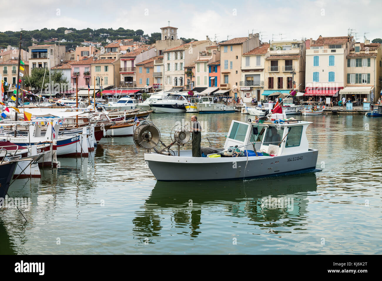 Cassis Harbour with colourful buildings at seafront, Bouches du Rhone ...