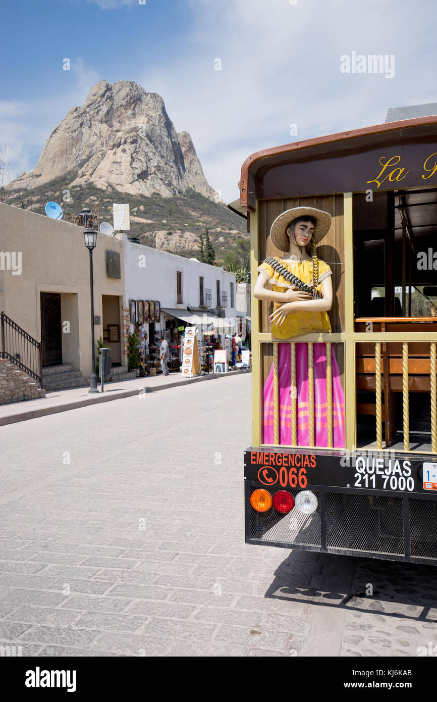 February 26,2016, Bernal, Mexico: tourist bus wth the Bernal monolyth ...