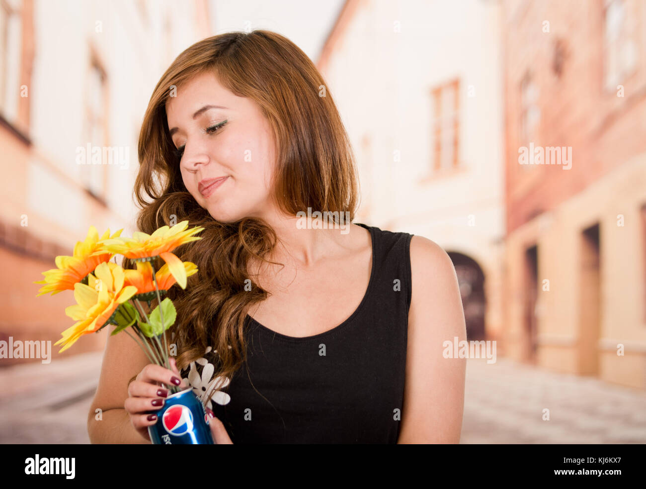 Quito, Ecuador May, 06, 2017: Pretty young woman holding a pepsi with ...
