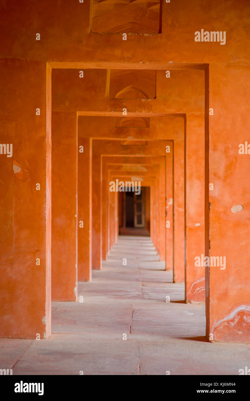 Beautiful view of a stoned path with columns in a row inside of a ...