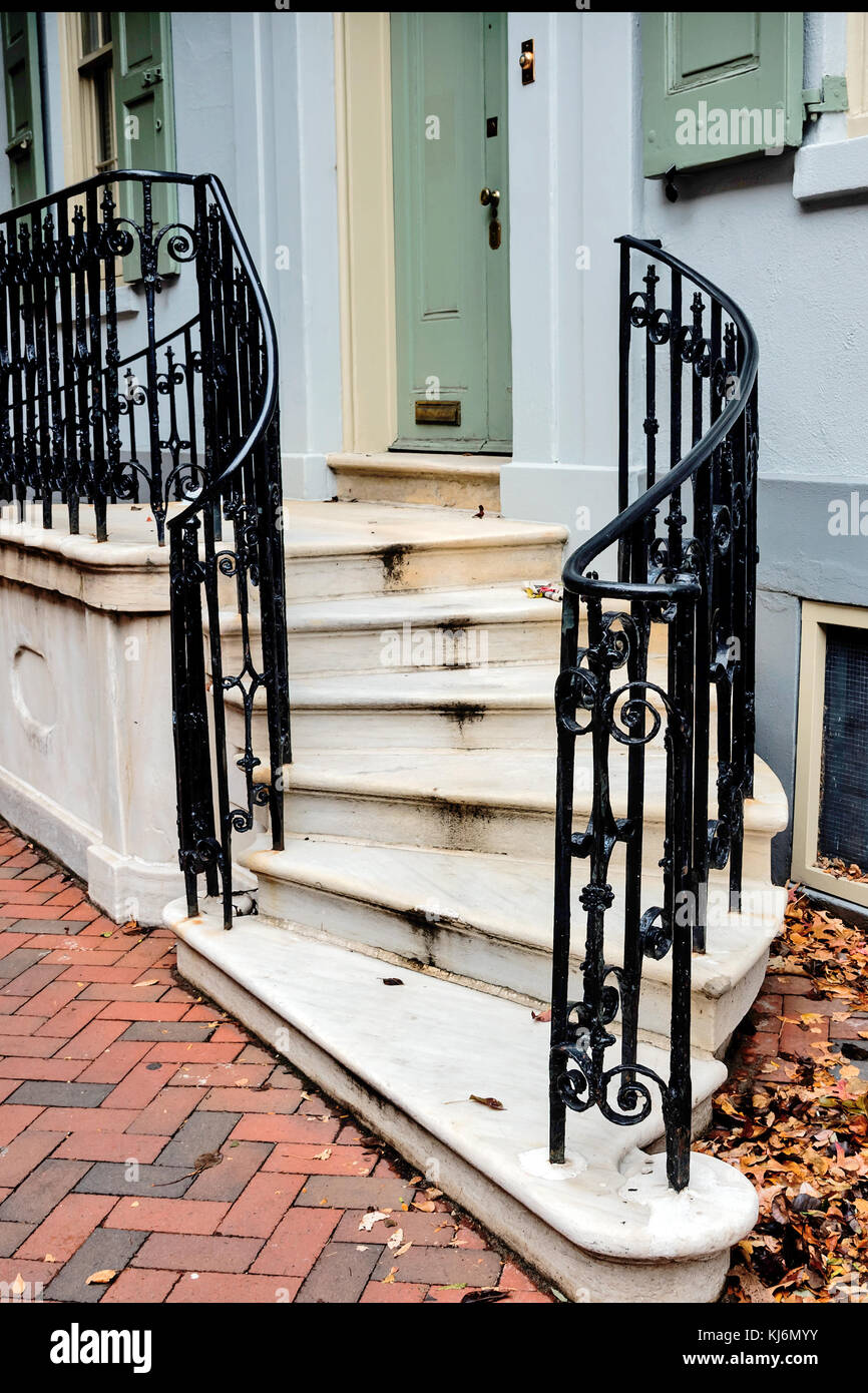 Marble porch of an old house with openwork metal railing, Philadelphia ...