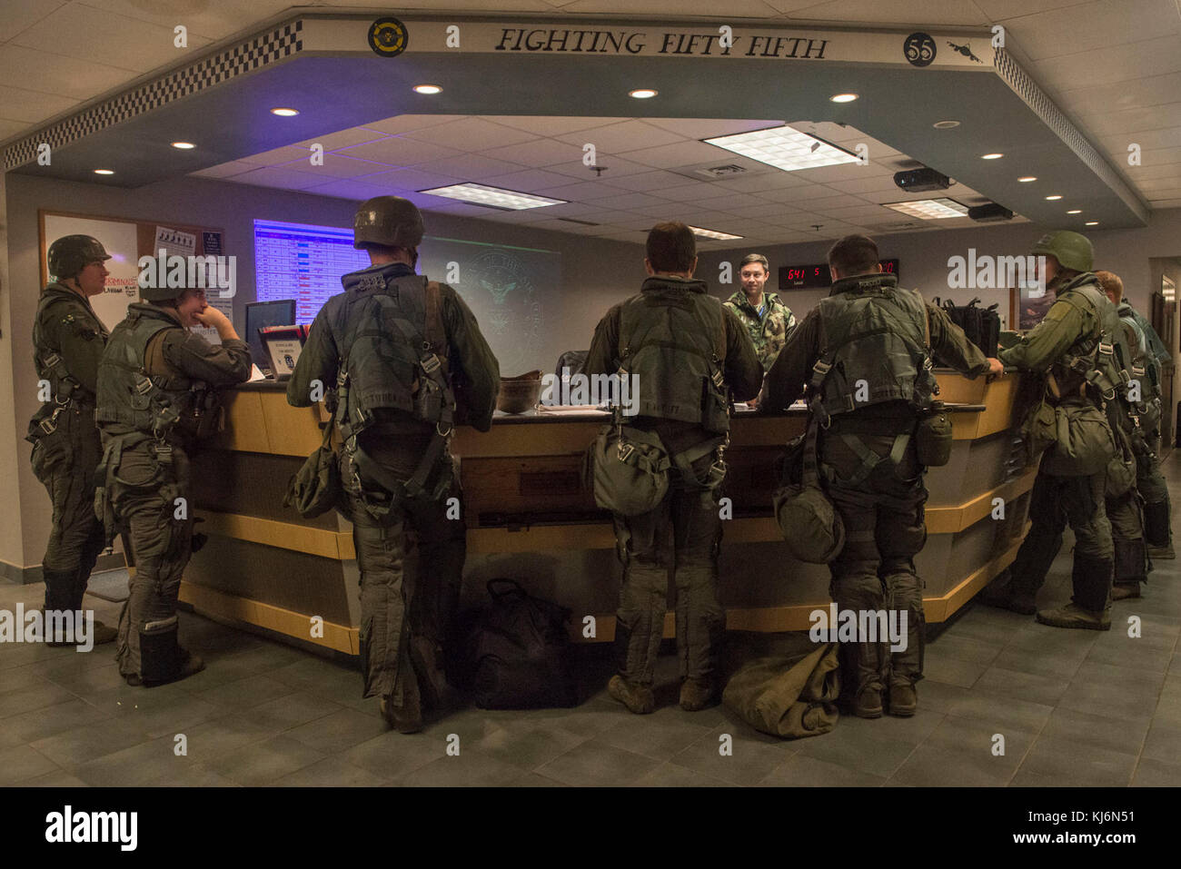U.S. Air Force pilots assigned to the 55th Fighter Squadron meet for a ...