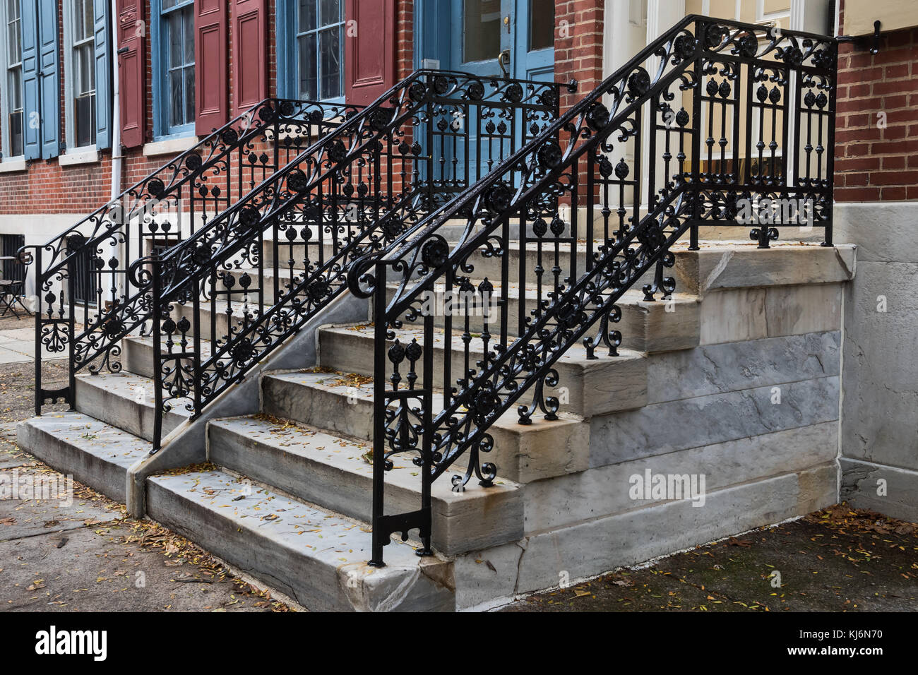 Marble porch of an old house with openwork metal railing, Philadelphia ...