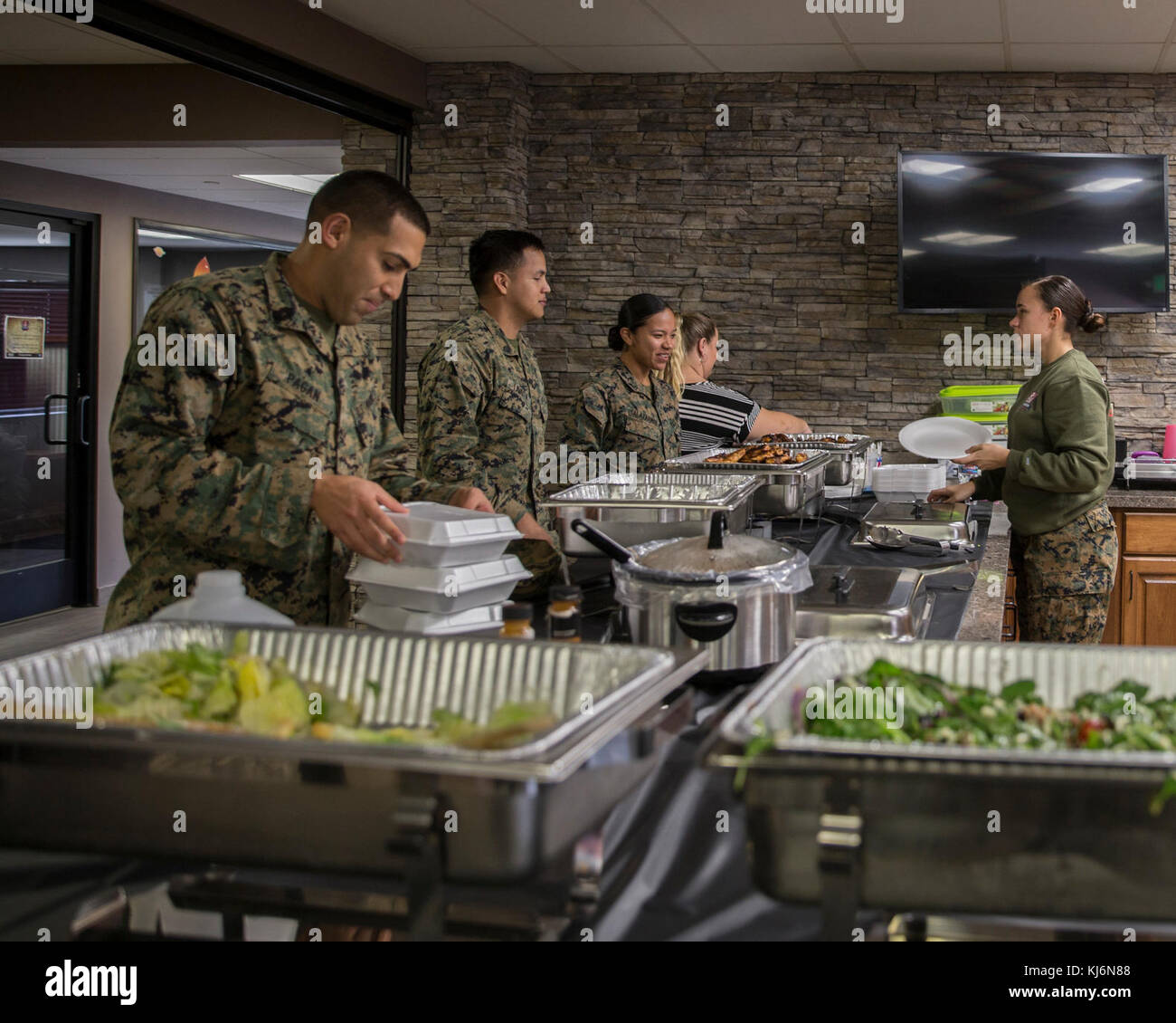 Marines and Sailors receive food during the Great American Smoke Out ...