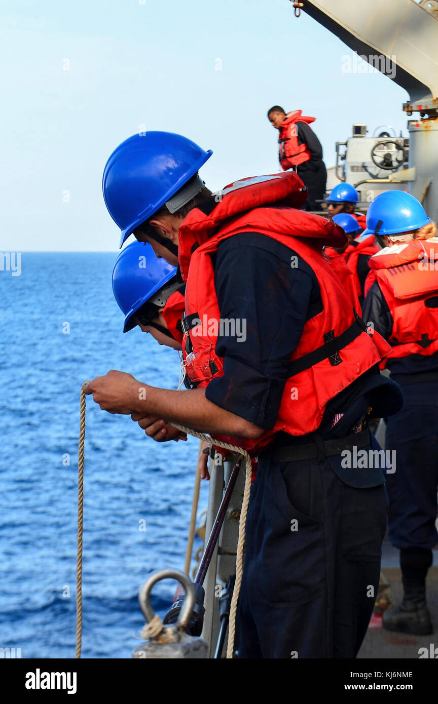 SOUDA BAY(Nov. 17, 2017) Seaman Andrew Pojar lowers a line attached to ...