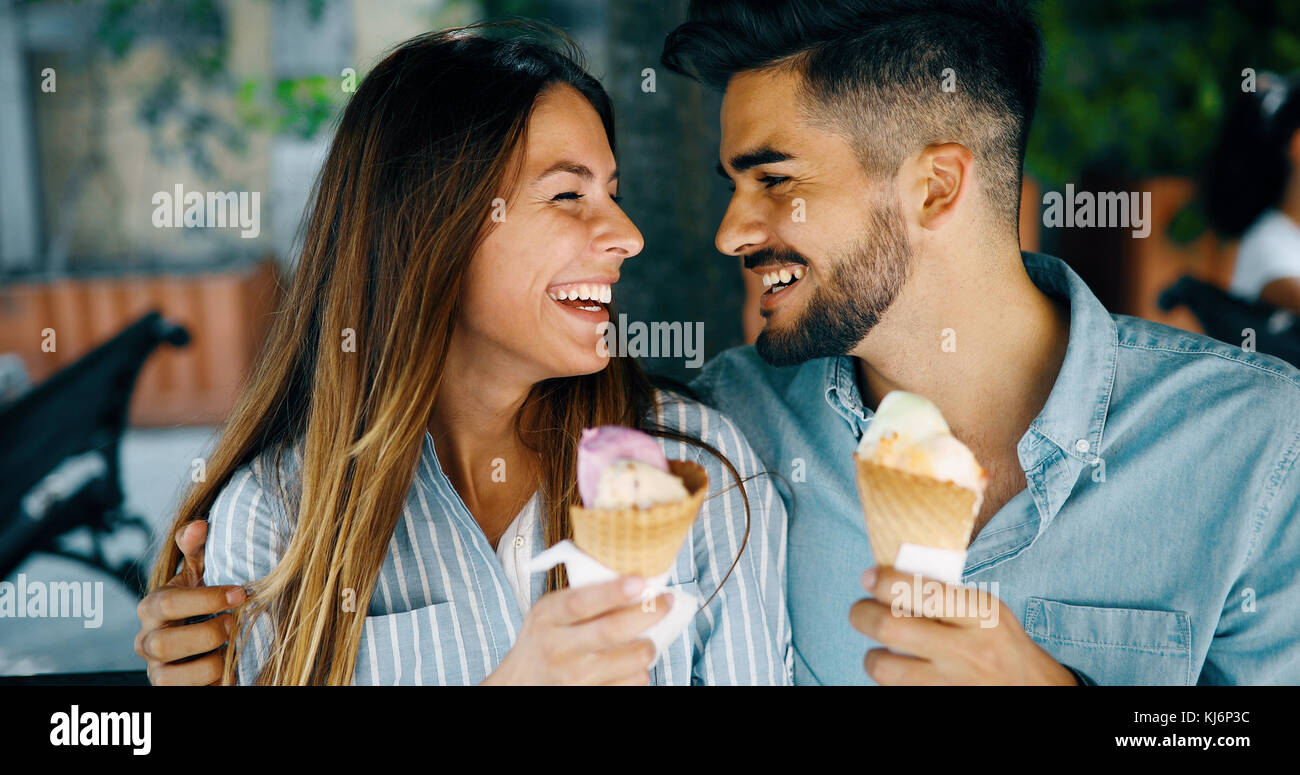 Woman man sitting eating icecream hi-res stock photography and images ...