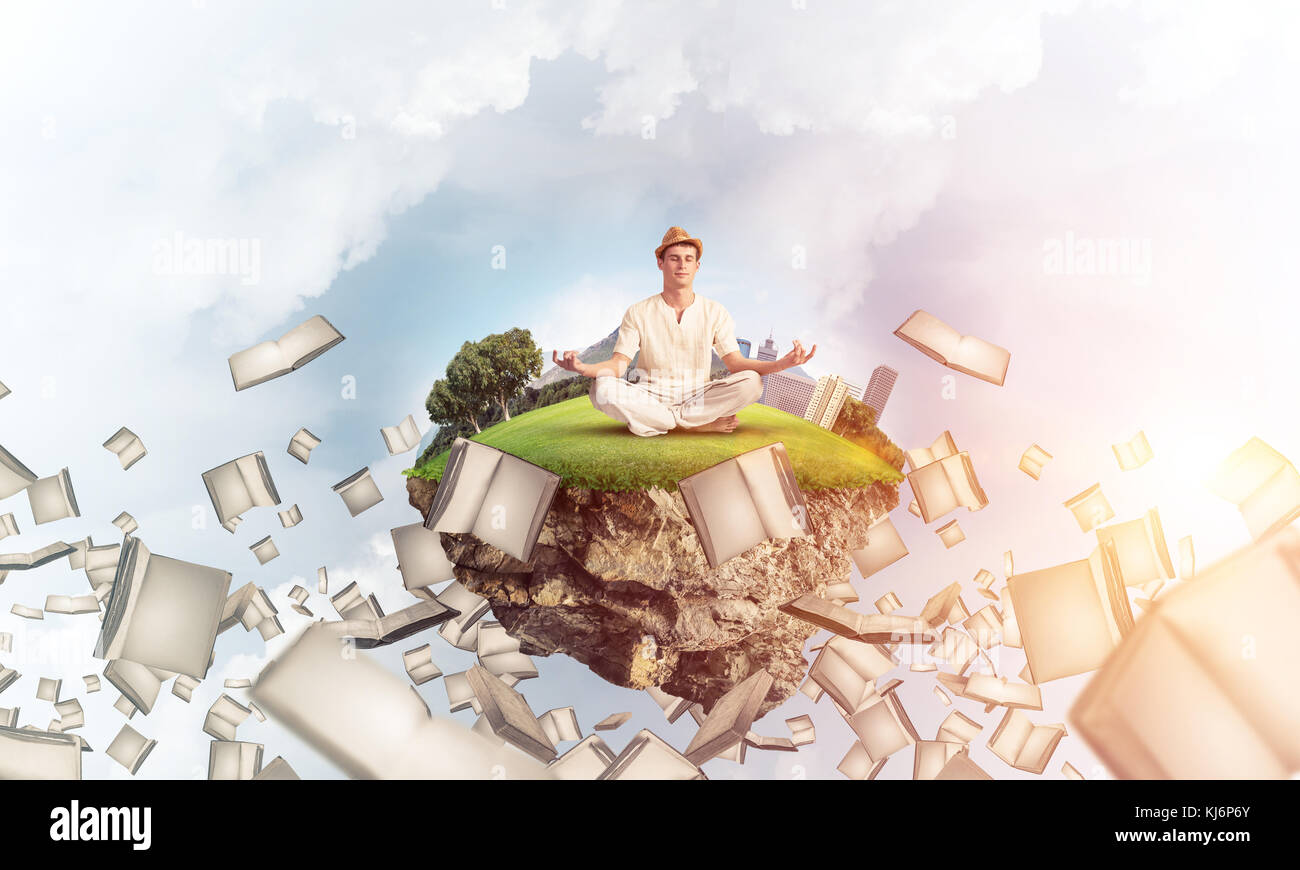 Young man keeping mind conscious Stock Photo - Alamy
