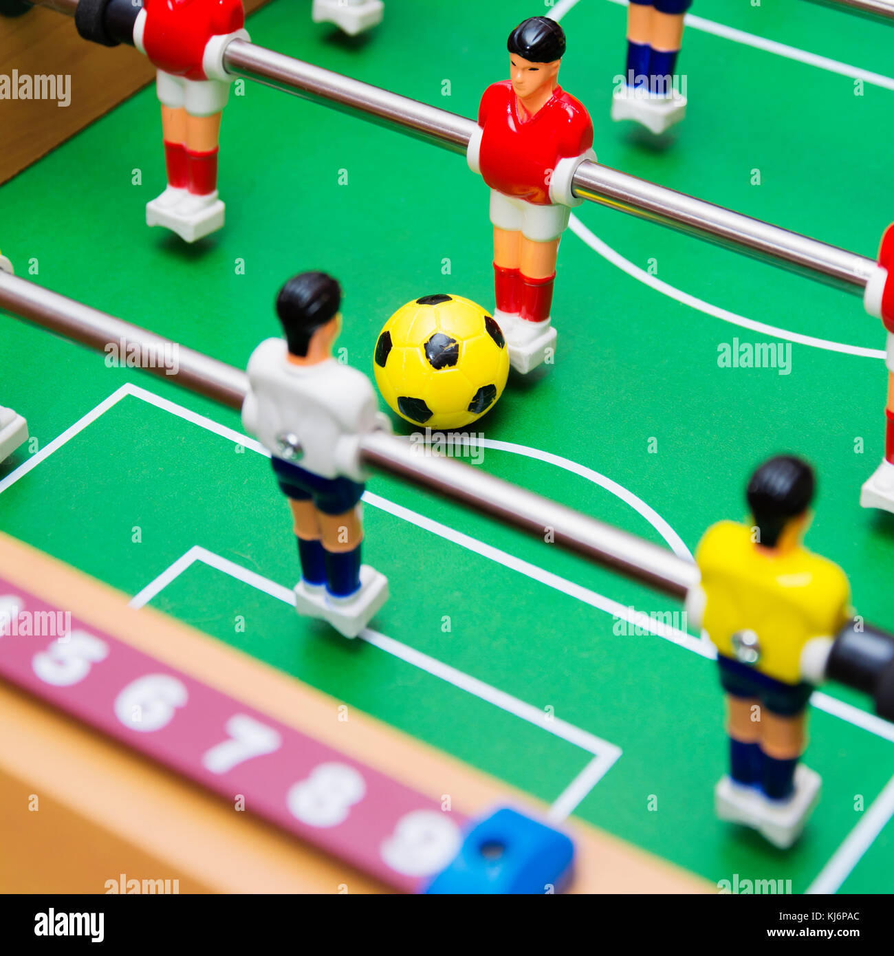 table football soccer game, close up, yellow ball Stock Photo - Alamy