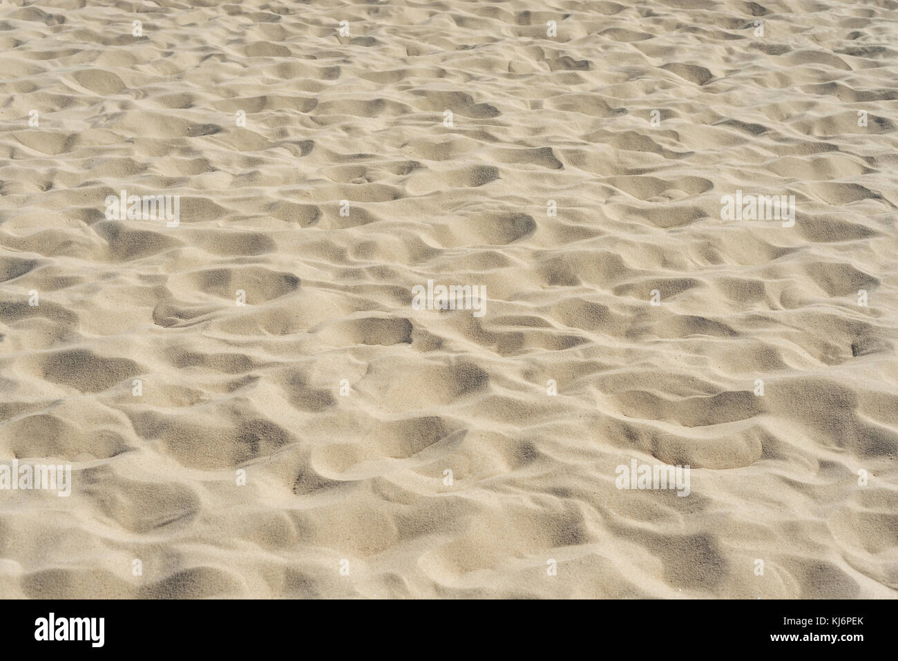 sand on the beach as background. soft focus in center of picture Stock ...